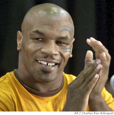 Tyson: Still a cryptic curiosity / Ex-champ has lost many skills, but ...