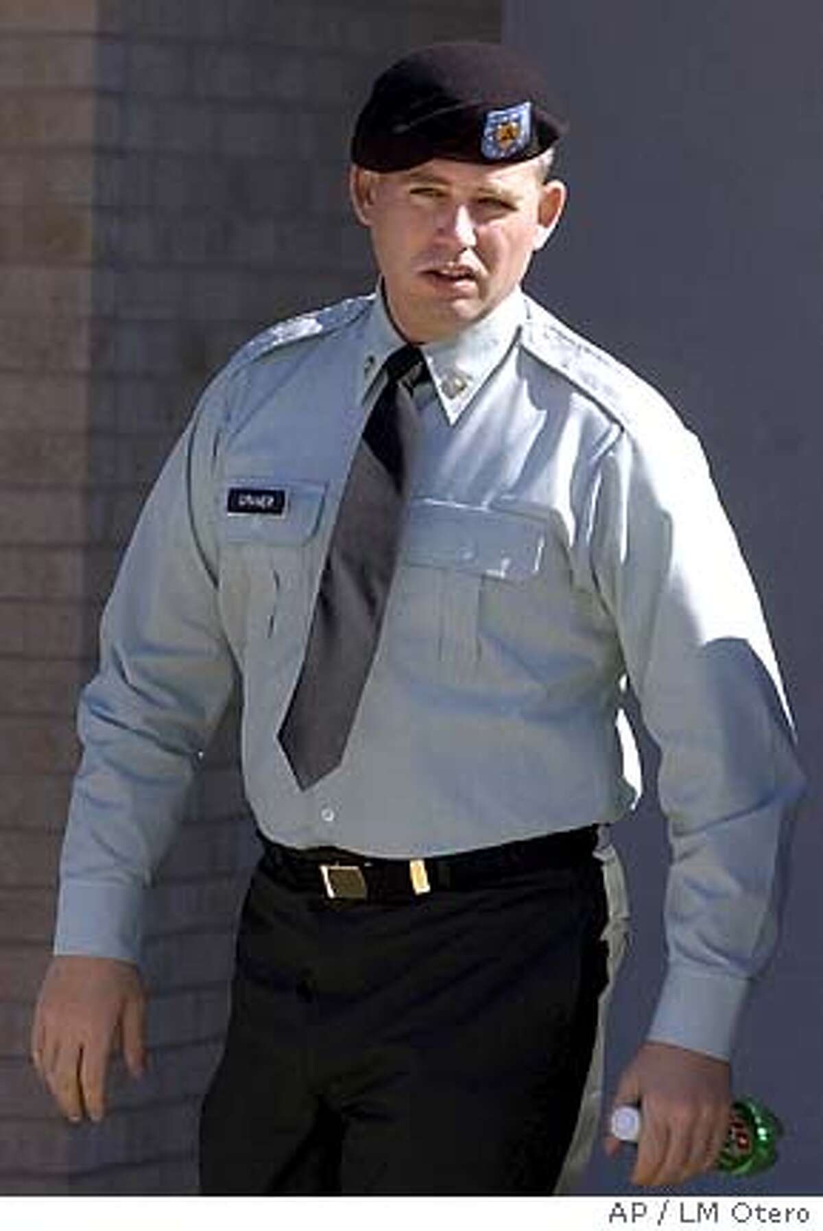 Defense rests in Abu Ghraib court-martial / Alleged ringleader doesn't ...