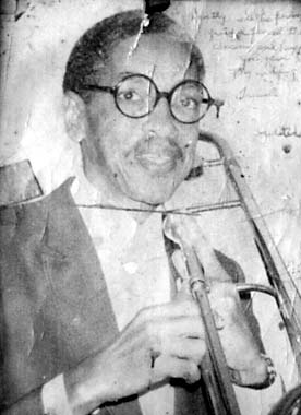 Jazzman dies after beating / Trombonist, 80, hit in wheelchair