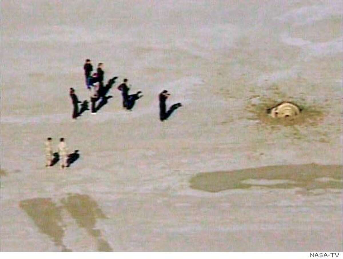 Space capsule crashes / Genesis, payload of solar particles slam into ...