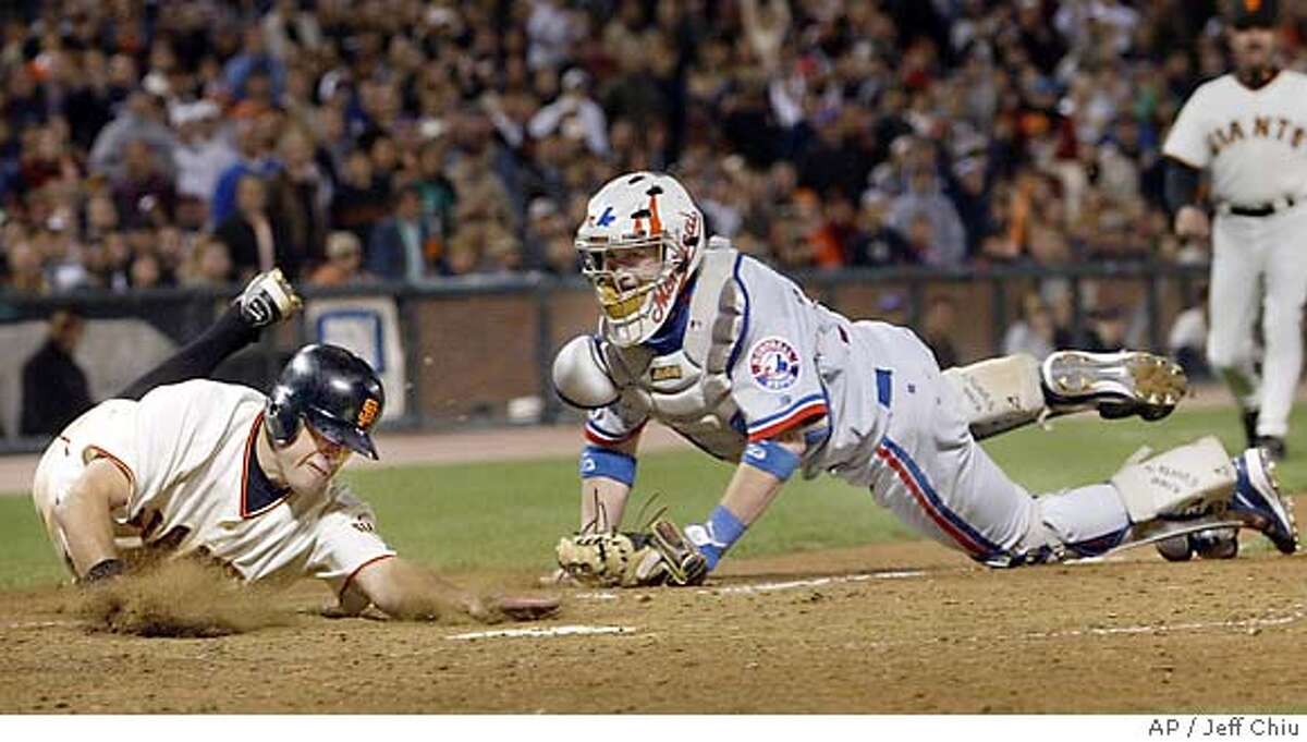 Schmidt injured in Giants' victory / Snow drives in winning run in 9th
