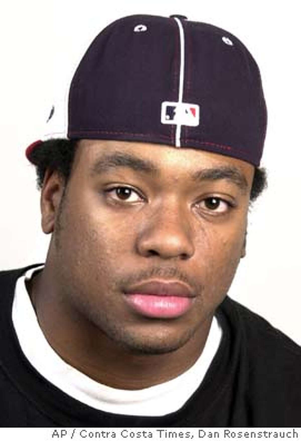 RICHMOND / Arrest made in slaying of football standout / Suspect played ...