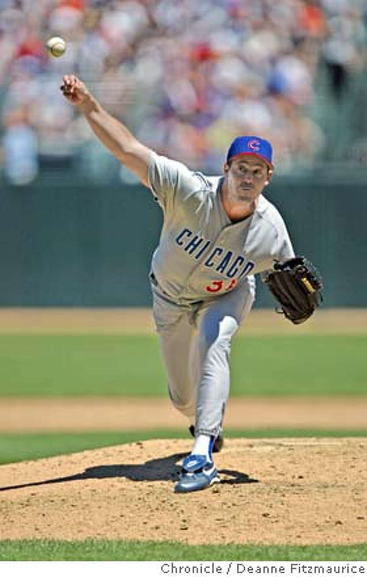 No. 300 in the books / Giants 3 back in wild-card race after Cubs rally