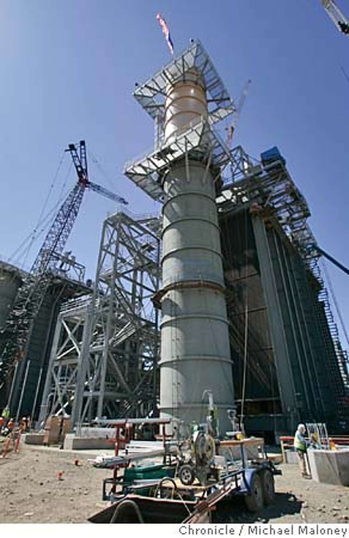 Calpine expecting to post heavy loss / Energy firm must reduce book ...