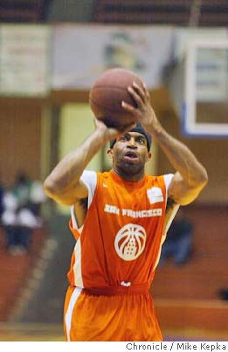 Rebound of a lifetime / Months after parole, playground basketball ...