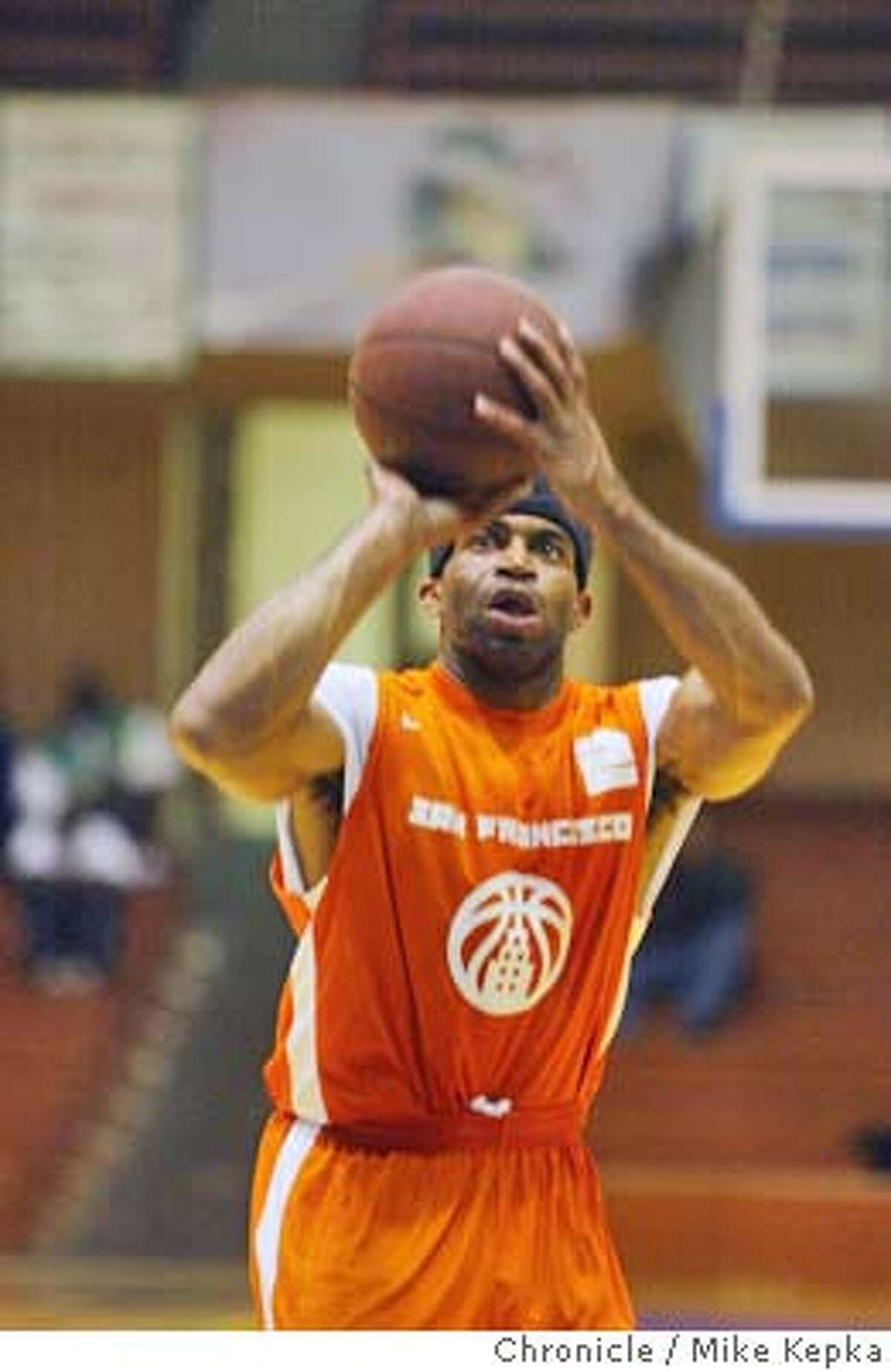 Rebound of a lifetime / Months after parole, playground basketball ...