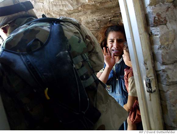 4 Iraqi guards die in firefight / Attackers flee when U.S. copters arrive