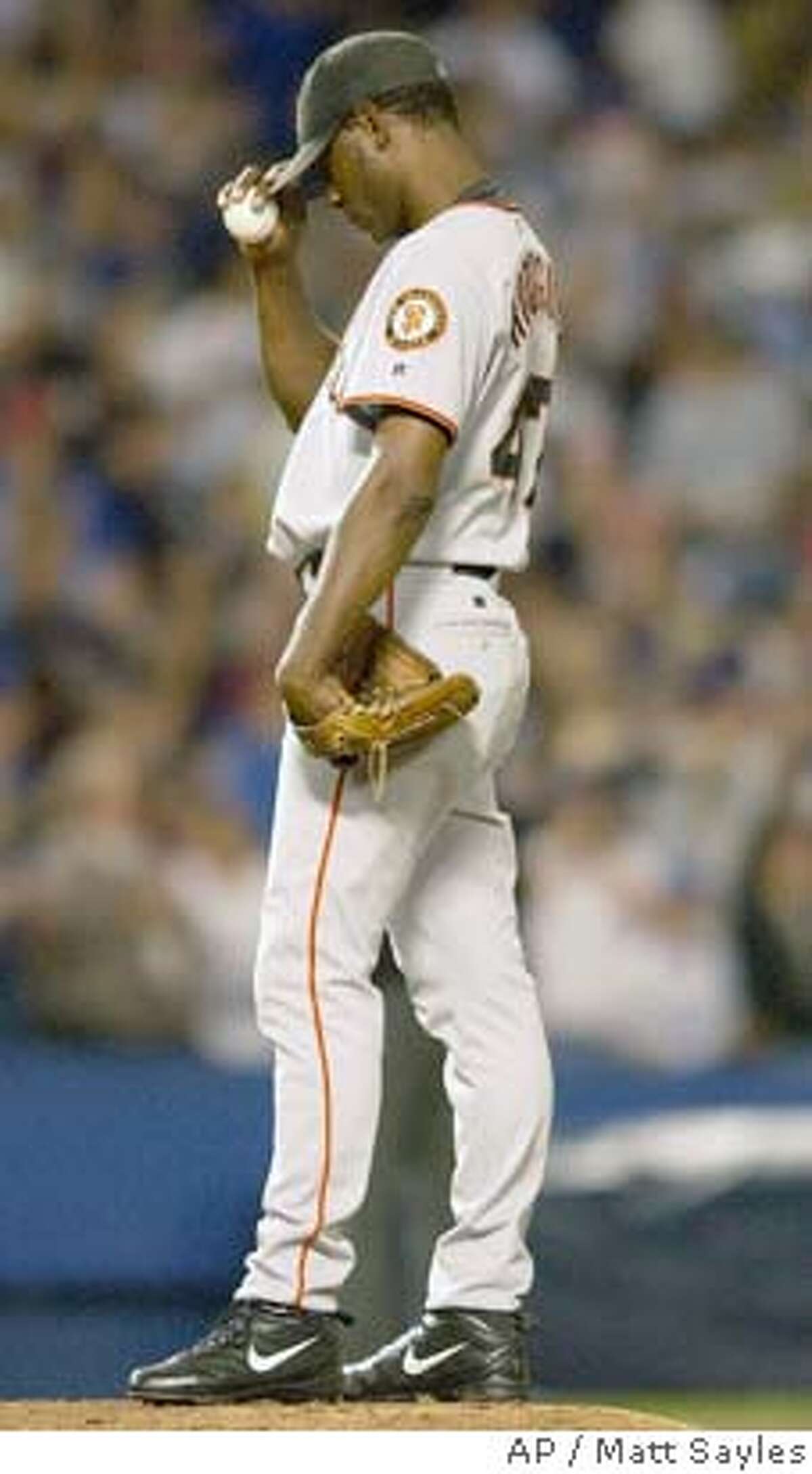 L.A. burns Rodriguez -- Giants drop series