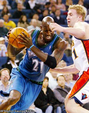 Warriors' streak runs out / Garnett, T'wolves reserves turn on offense