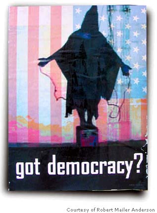 Covering the city with 'got democracy?' posters, writer confronts our ...