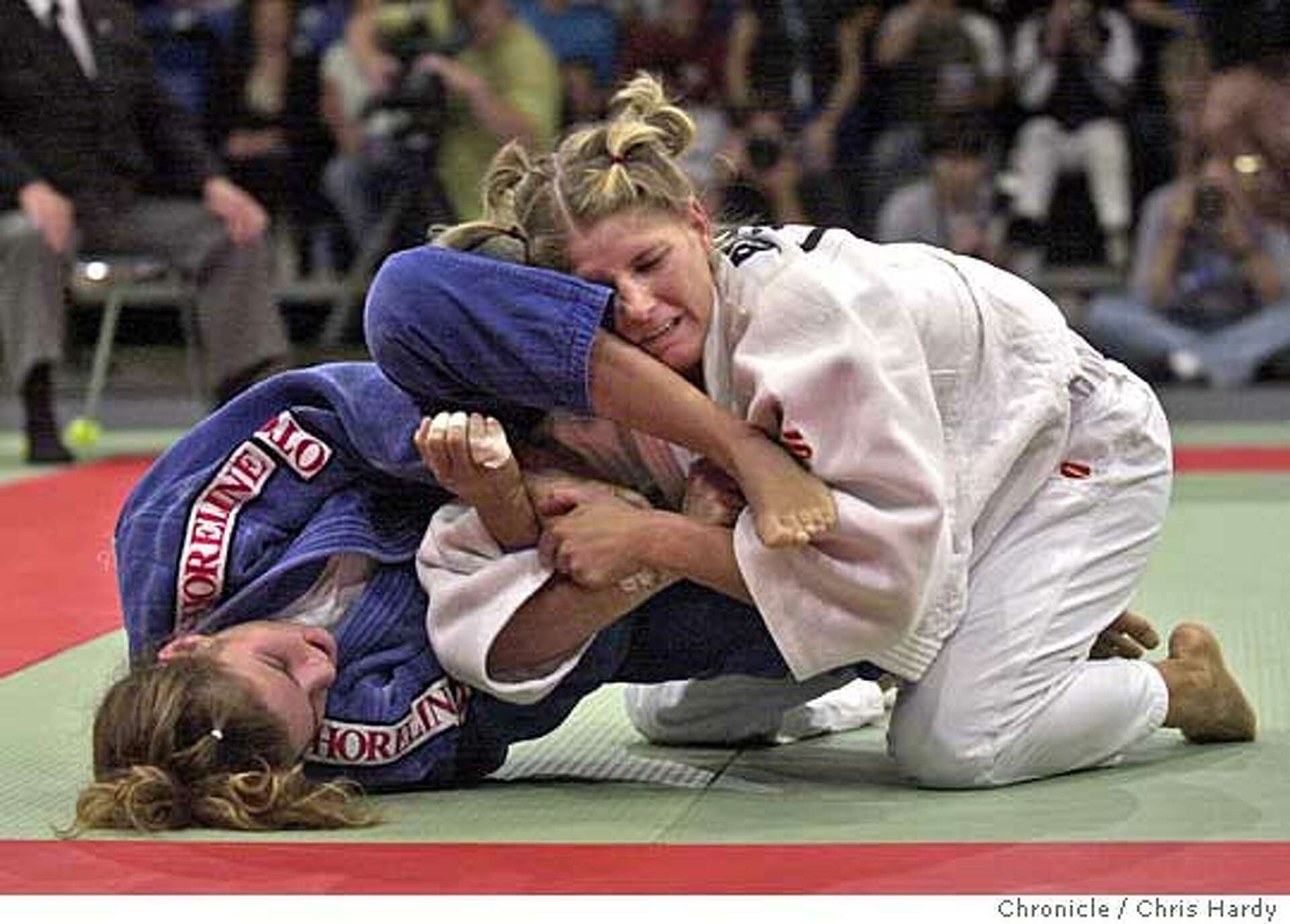 Youth prevails in judo / 'It was like fighting my mom,' says winner, 17