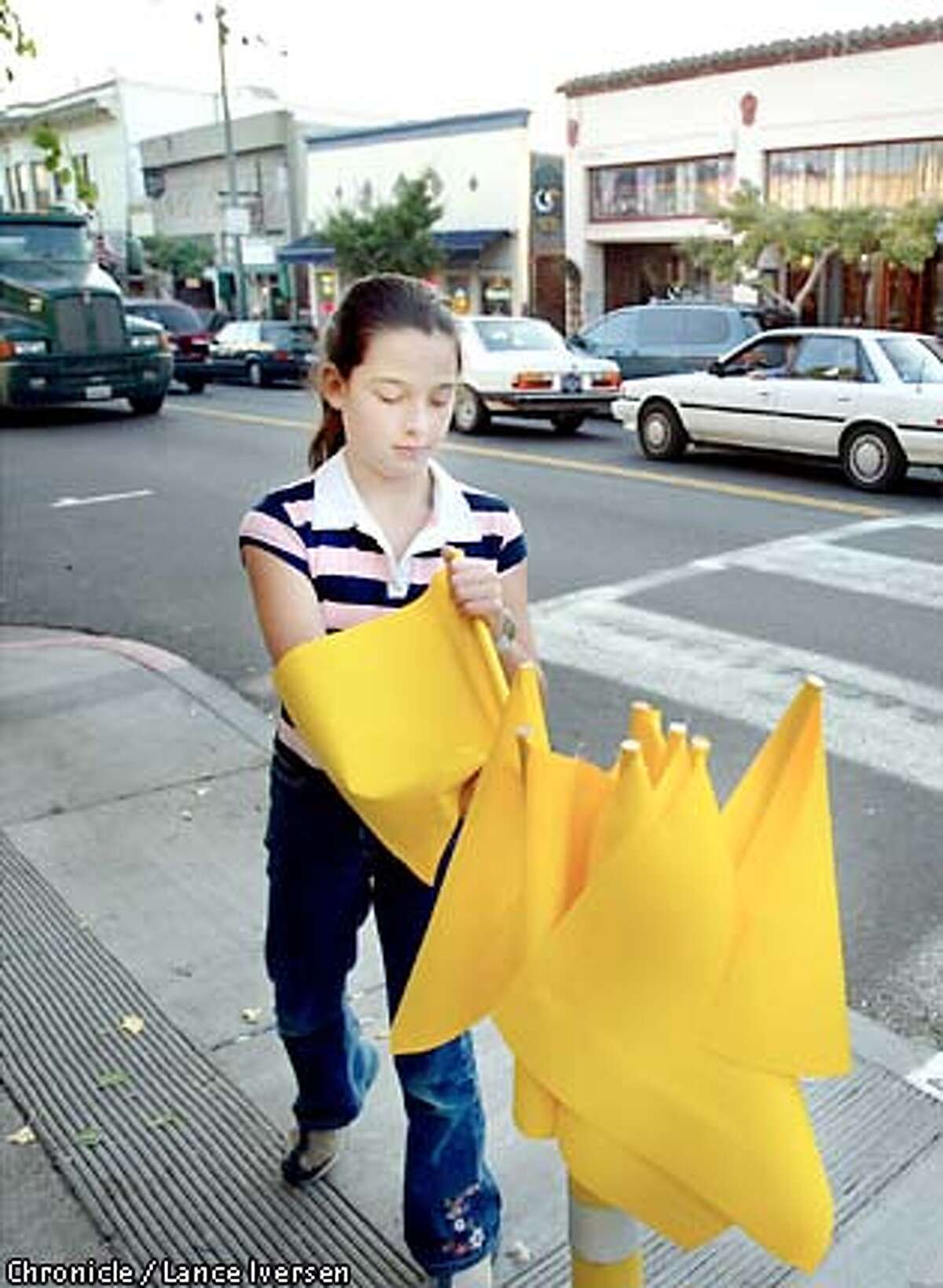 Pedestrian flags being tried again / Another try for pedestrian flags