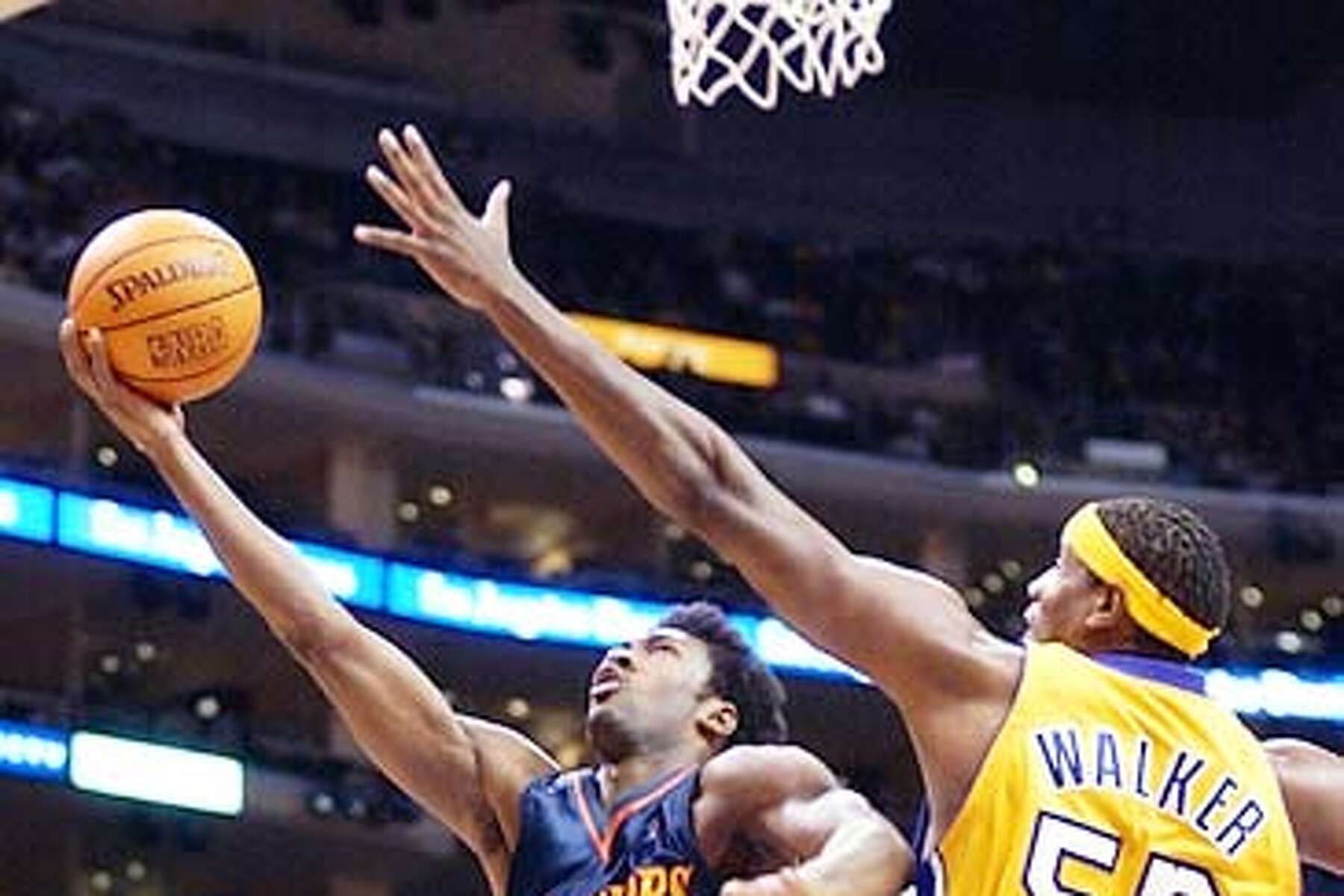 Kobe Bryant Dunks On Antawn Jamison