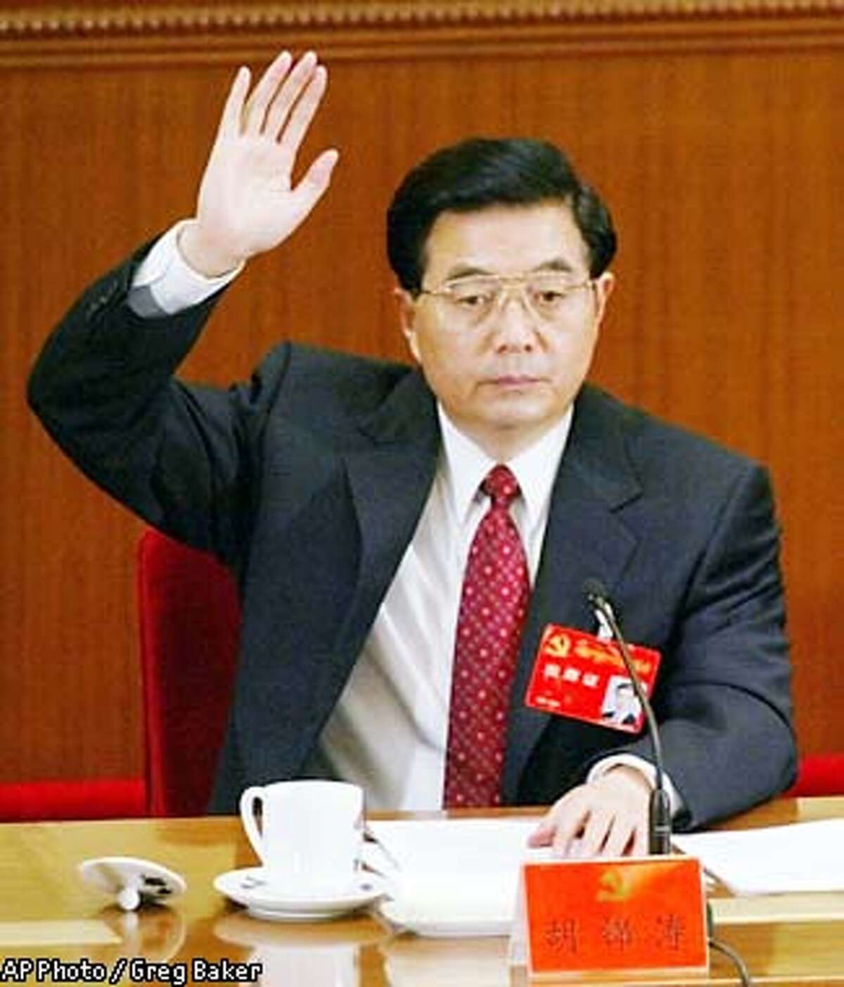 Chinese choose Hu to take over helm of party / Most orderly shift ever ...