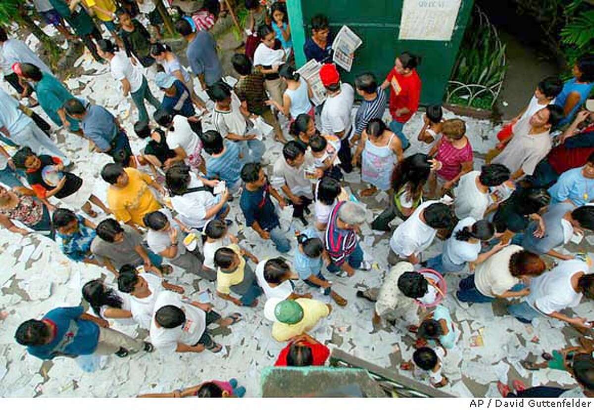 Arroyo has early lead, polls find / Final tally in Philippines race is ...