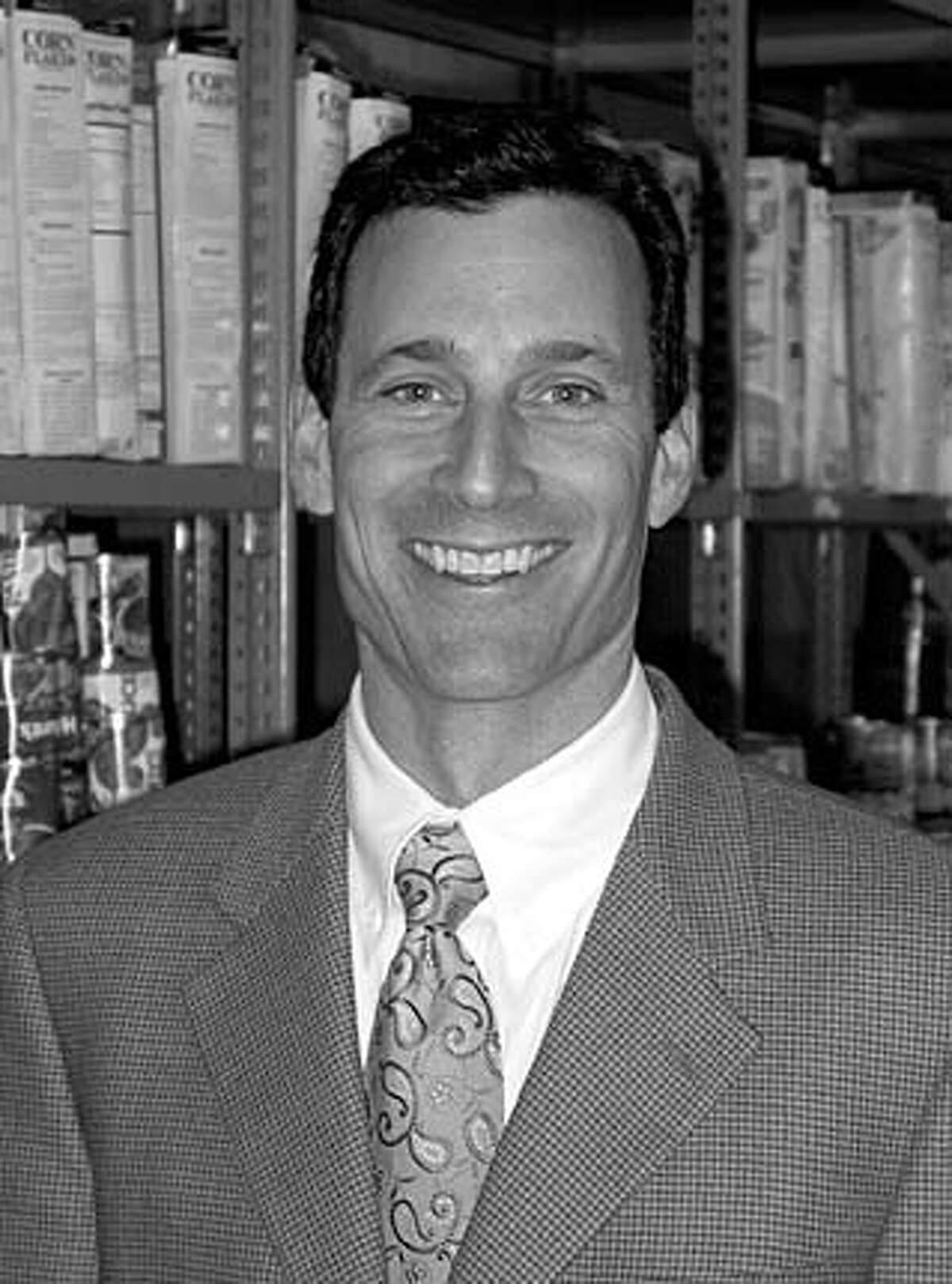 PROFILE / Food bank director casts a wide net to help the hungry ...