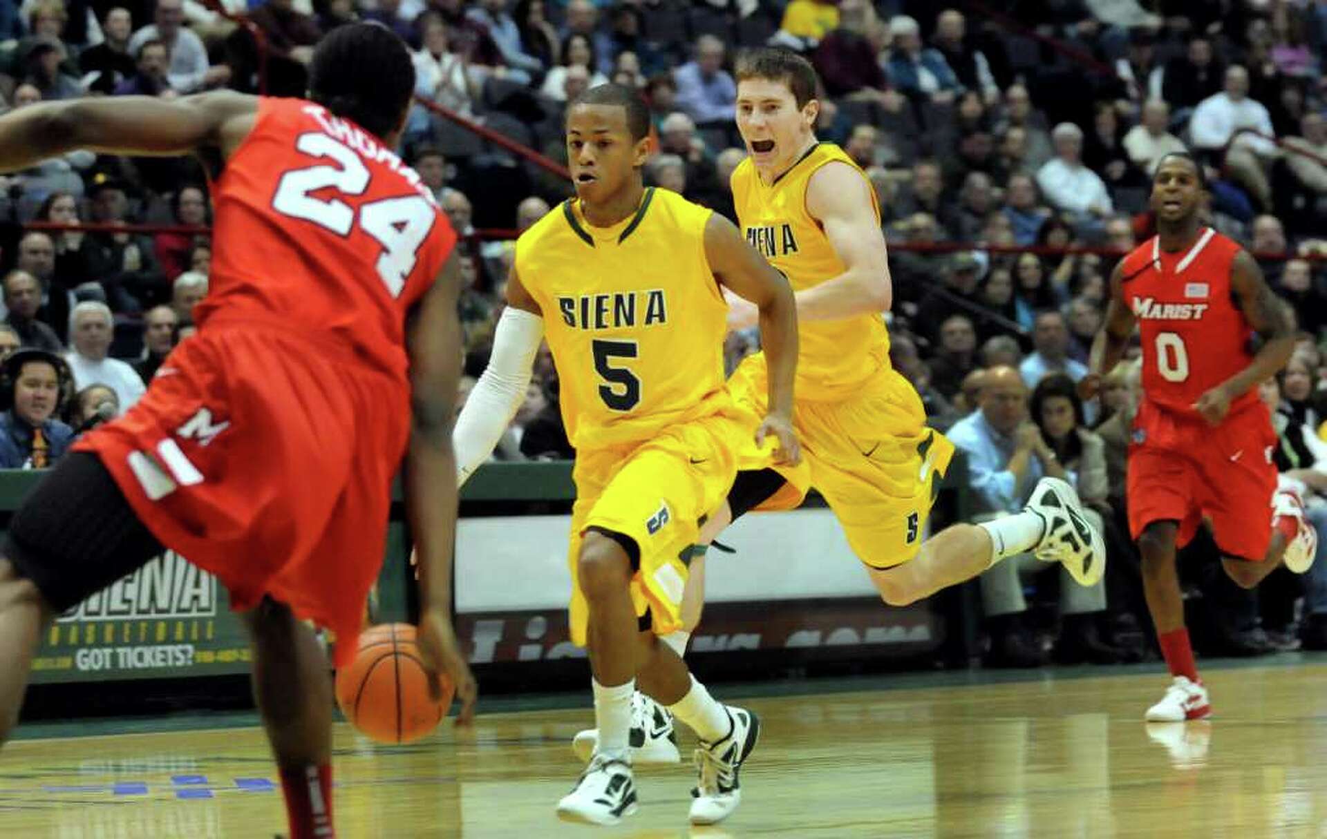 Saints race by Marist