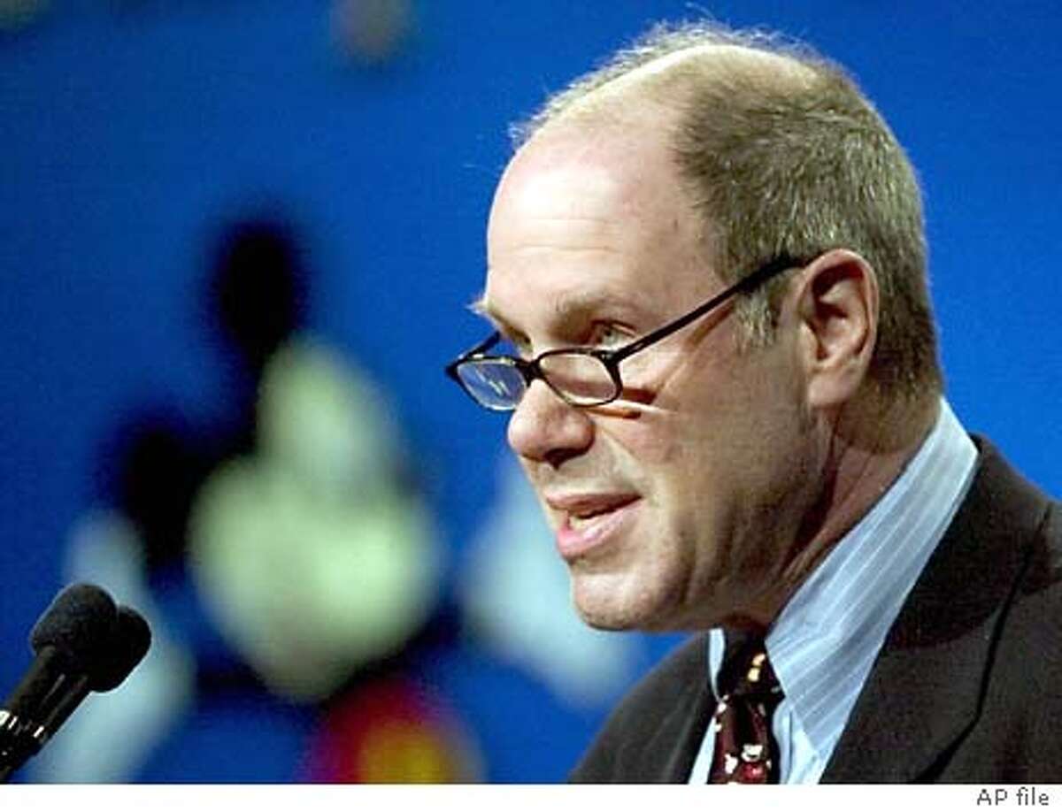 Eisner facing sea of wrath / As Comcast bows out, Disney CEO remains on ...