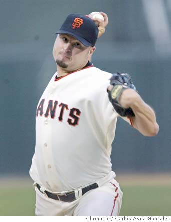 Schmidt labors, but lifts Giants