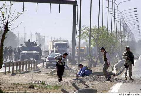 In Fallujah, pride, shame meet / Many support the killings, condemn the ...