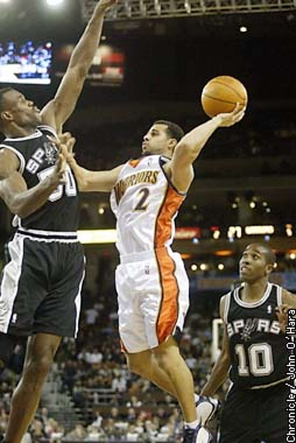 Warriors shock Spurs in opener / Jamison, Foyle excel in stunner