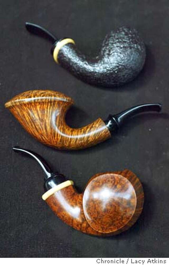 Pipe dreams / Cigar, pipe aficionados take refuge in tobacco shop to ...