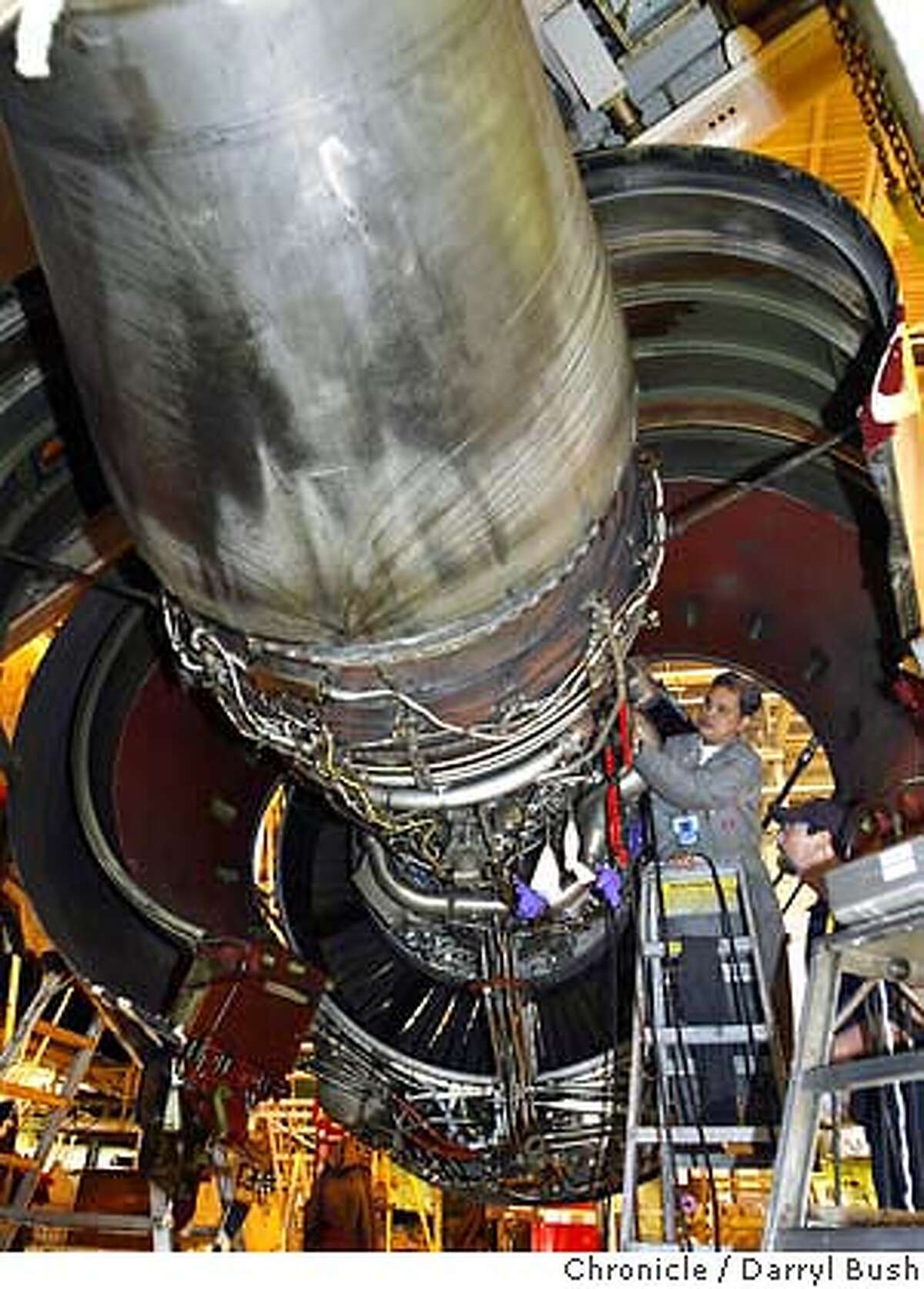 The jumbo jet garage / Bankrupt United rehiring mechanics at huge SFO base