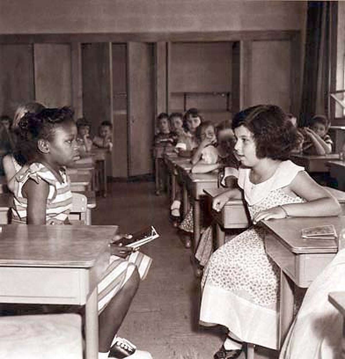 The 50th anniversary of school desegregation / Two books examine a ...