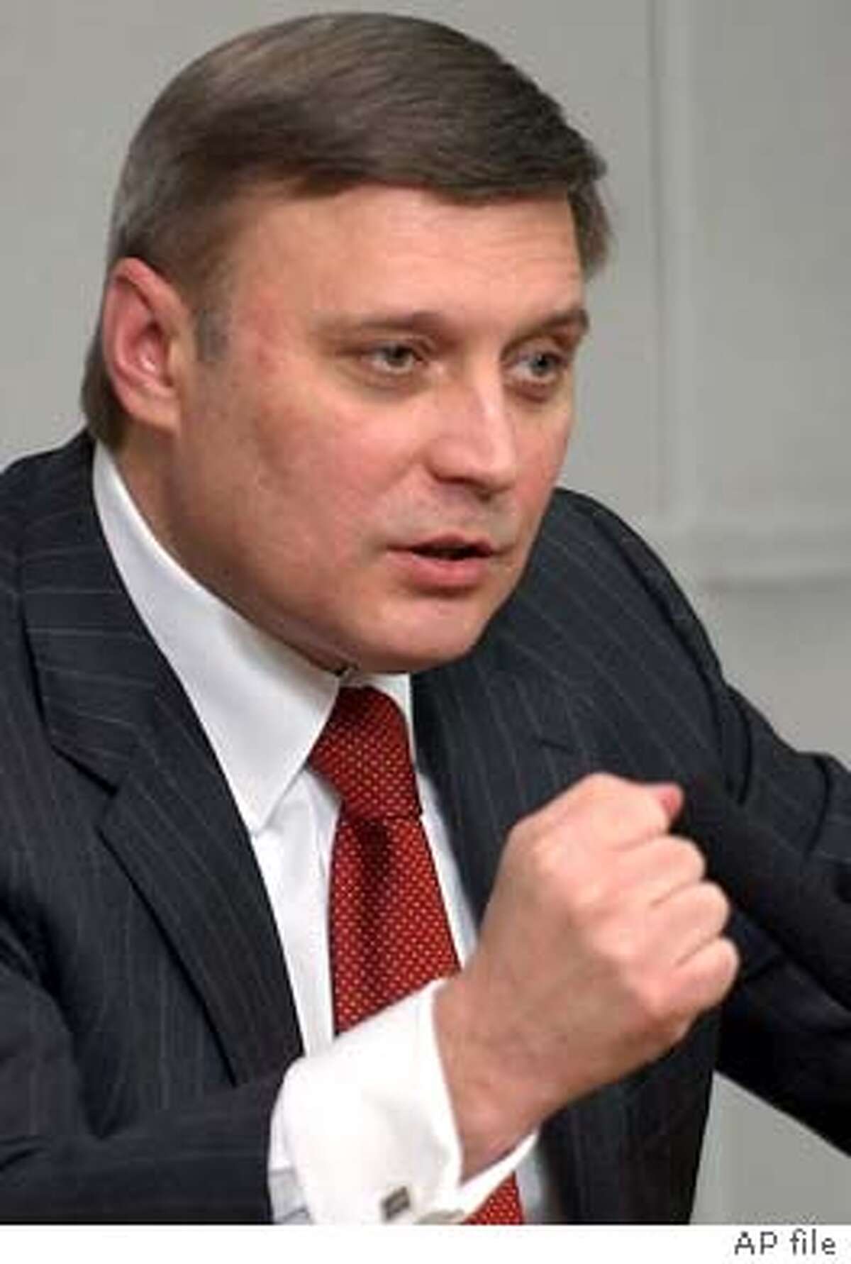 Russia's Putin fires Cabinet before vote / Reshuffle seen as aimed at ...