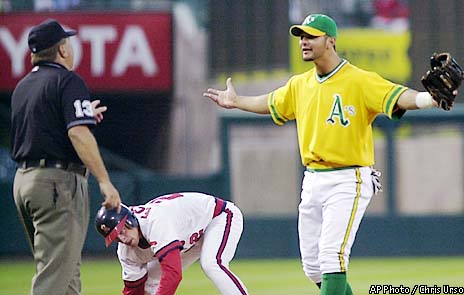Angels thwart A's / Anaheim beats Hudson again