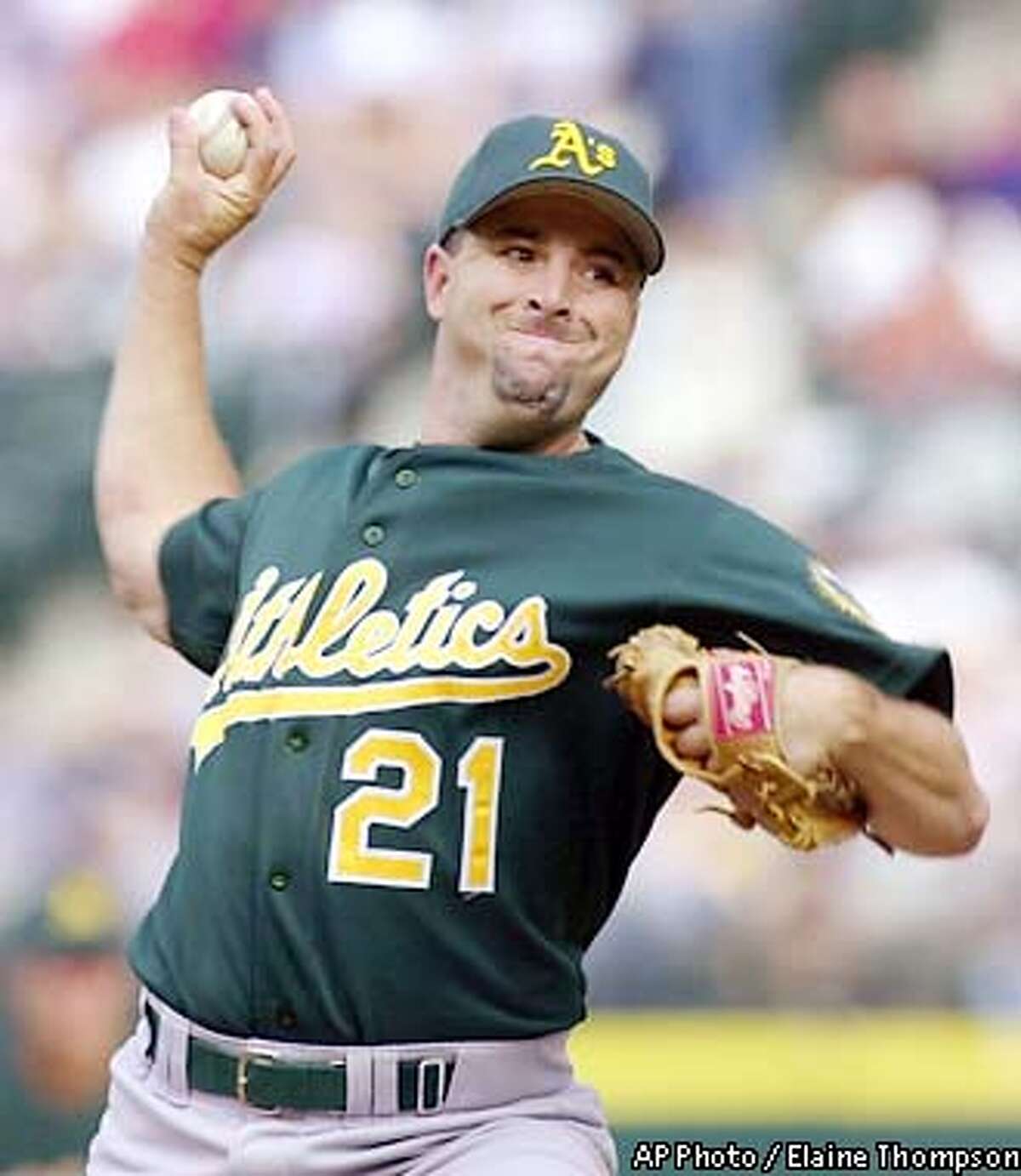 A's clinch title in style / Oakland wins 100th with 10th-inning rally