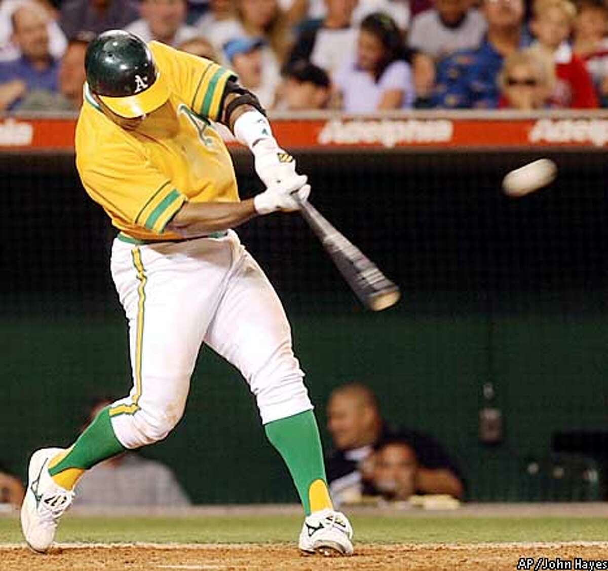 Tejada puts A's over the top / All-Star uses glove, bat to stop Angels