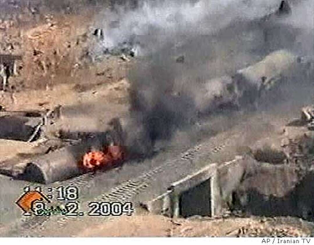 Train explosion in Iran kills 200 / Many of dead were in crews fighting ...