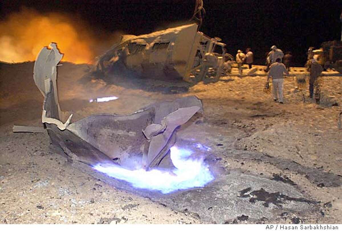 Train explosion in Iran kills 200 / Many of dead were in crews fighting ...