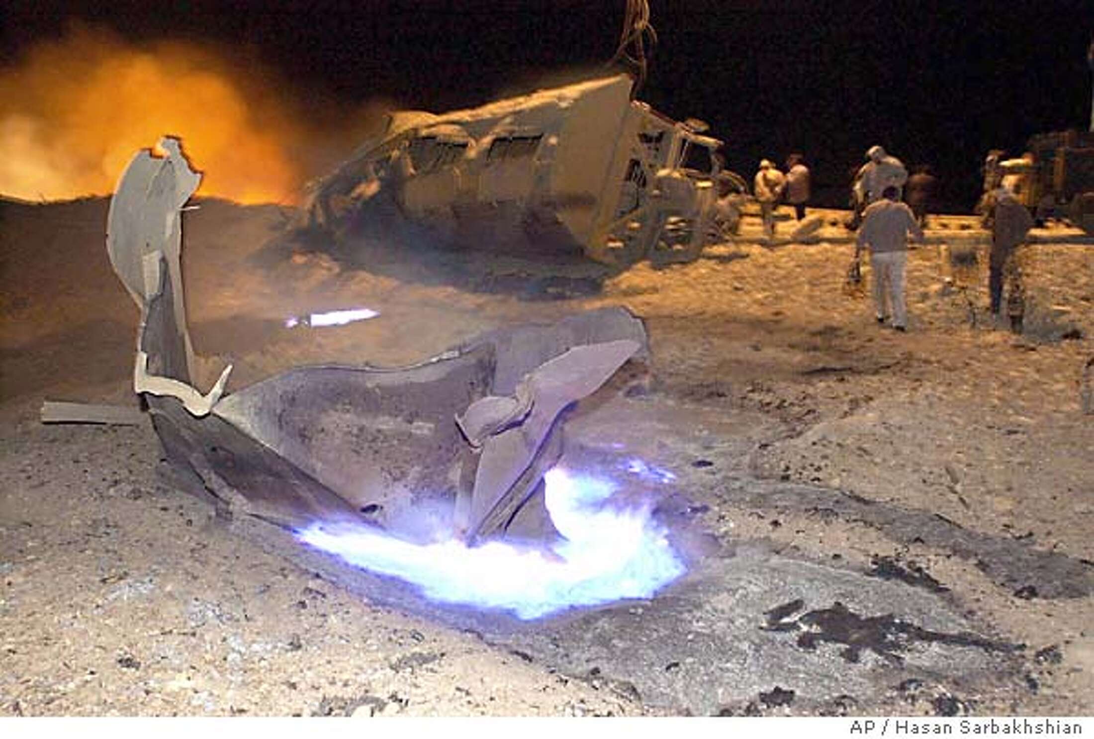Train explosion in Iran kills 200 / Many of dead were in crews fighting ...