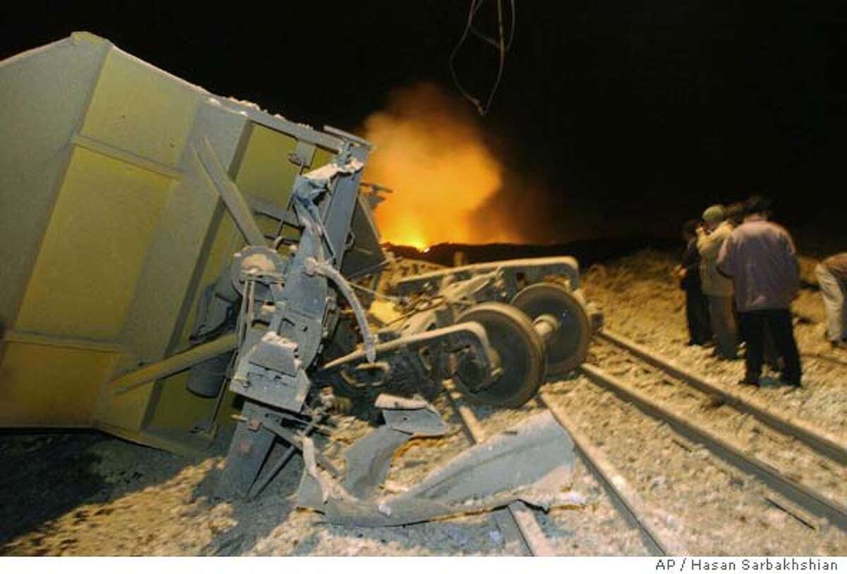 Train explosion in Iran kills 200 / Many of dead were in crews fighting ...
