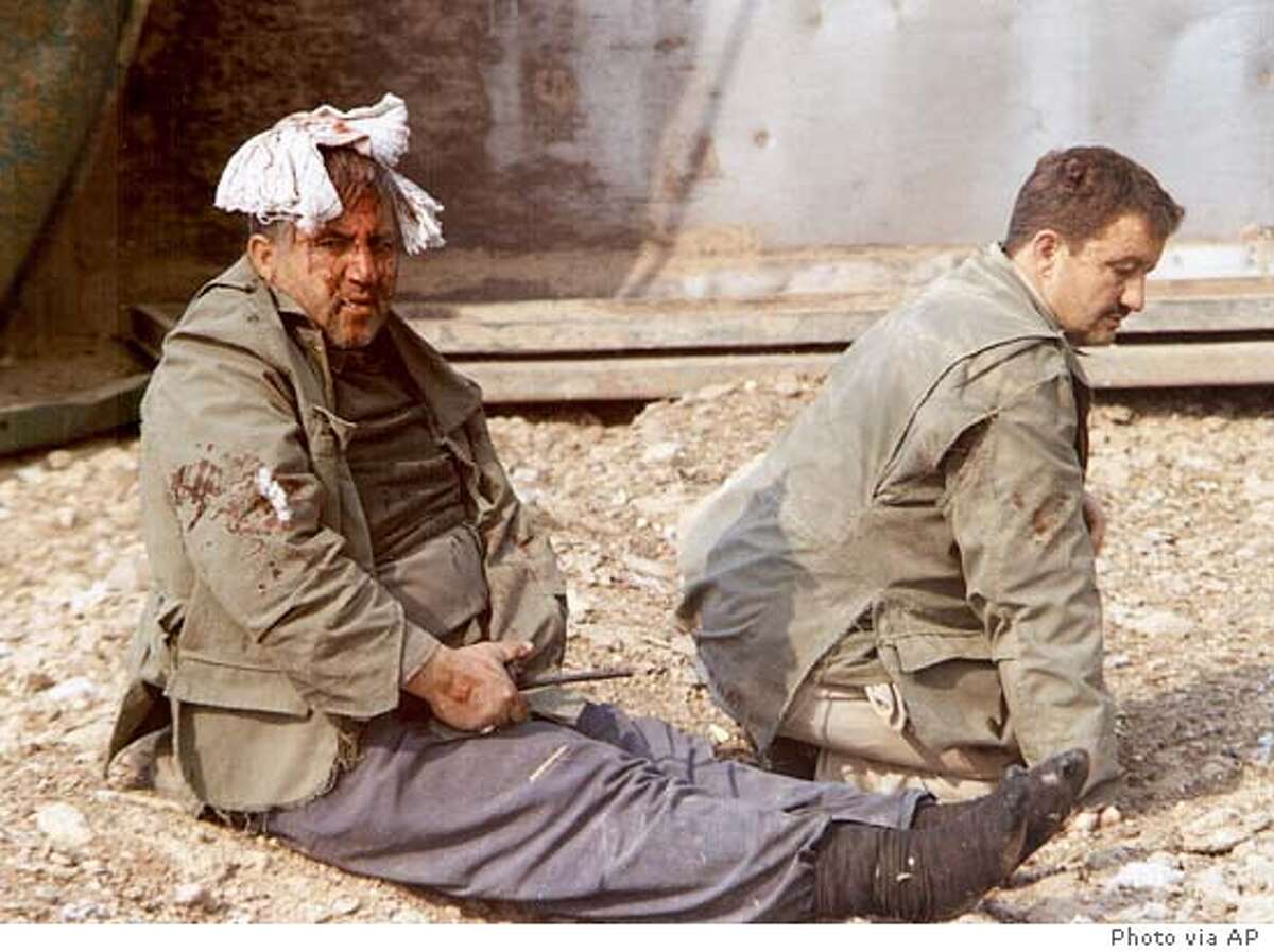 Train explosion in Iran kills 200 / Many of dead were in crews fighting ...