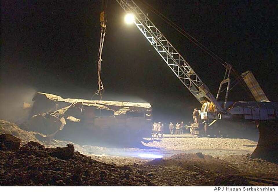 Train explosion in Iran kills 200 / Many of dead were in crews fighting ...