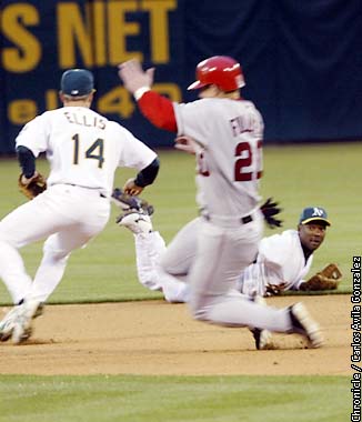 Angels rise up, pummel Hudson / Angels put hammer down on Hudson, A's