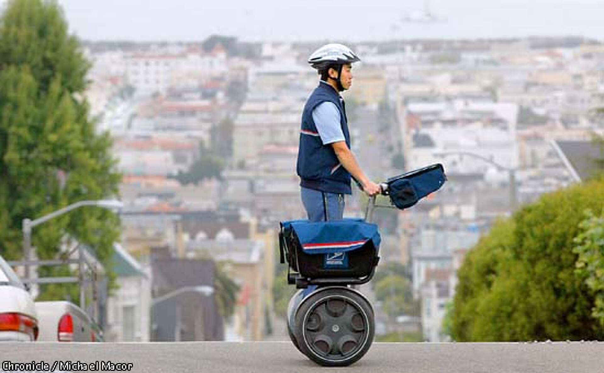 Dashing new device for delivering mail / Postal Service tries scooters ...