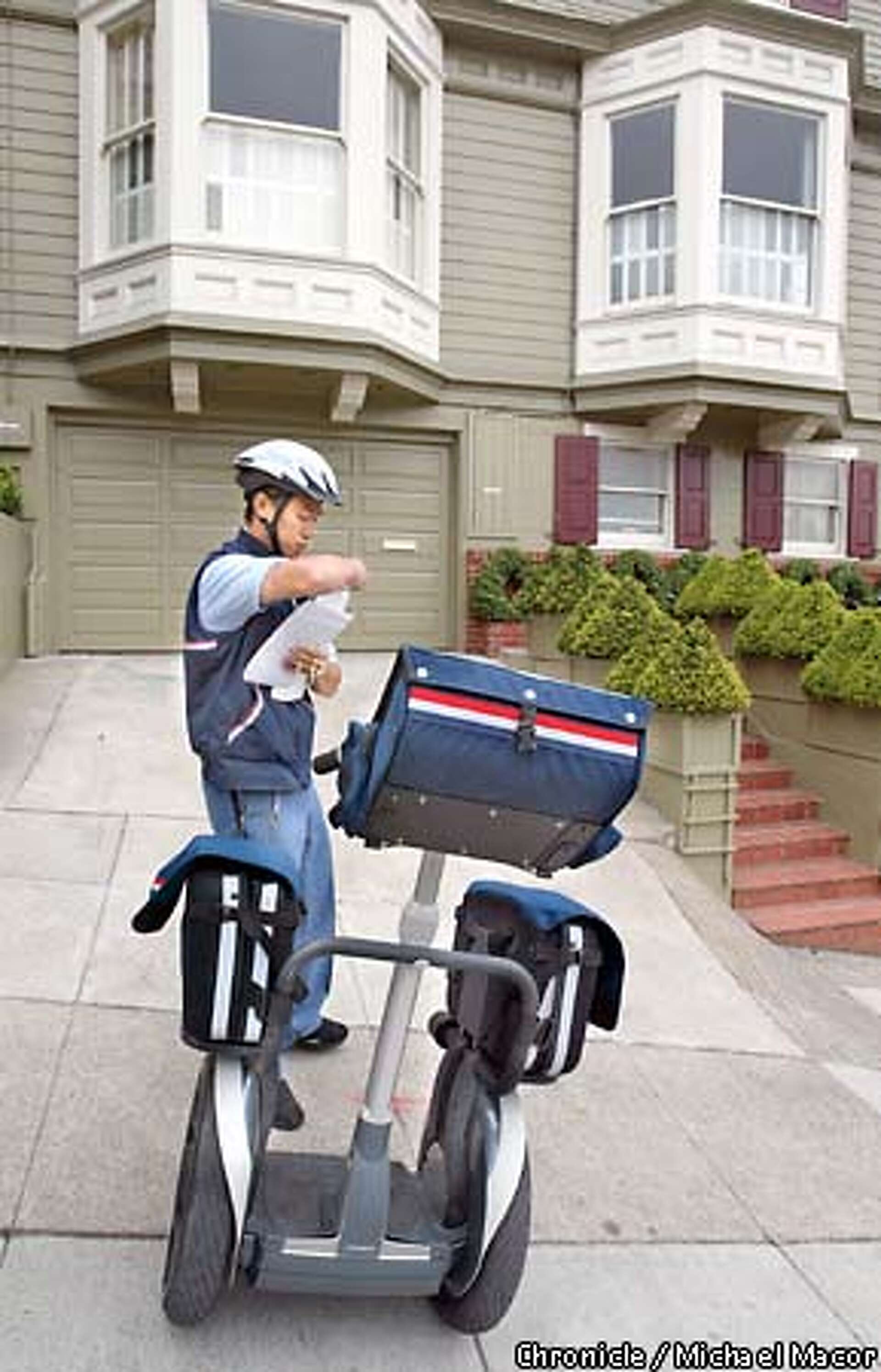 Dashing new device for delivering mail / Postal Service tries scooters ...