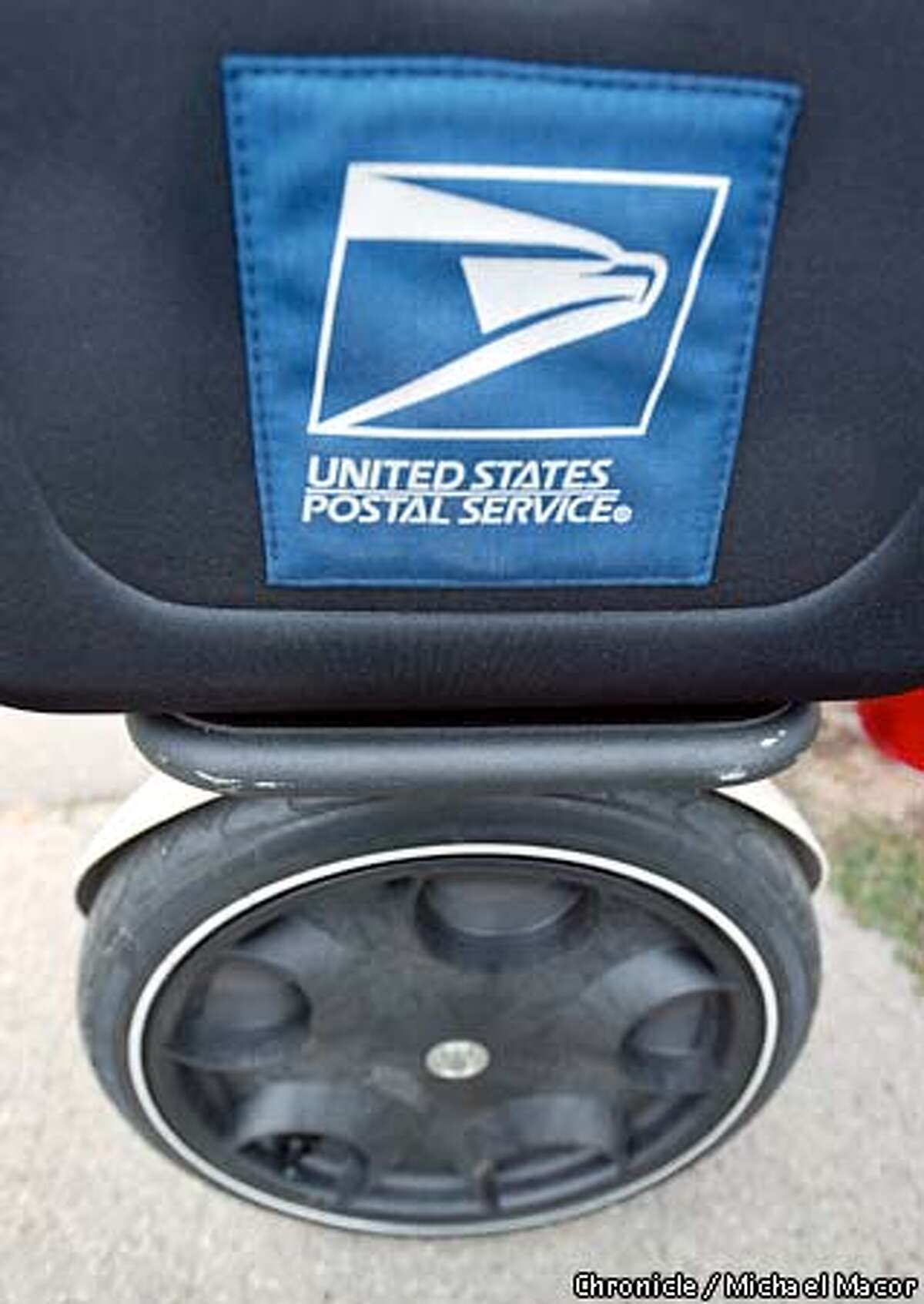Dashing new device for delivering mail / Postal Service tries scooters ...