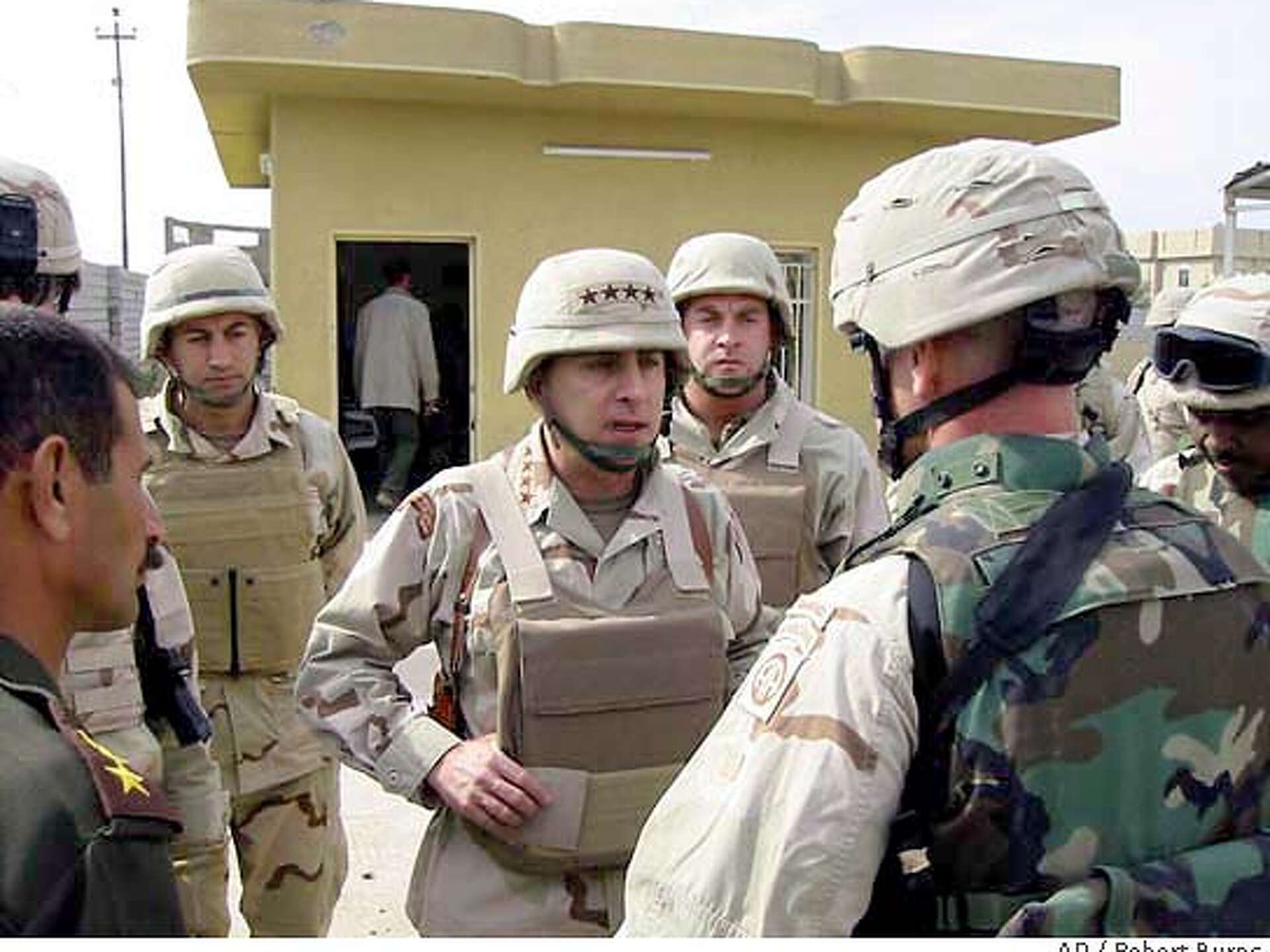 Iraqi grenades miss top U.S. commander / Gunmen escape after attack on ...