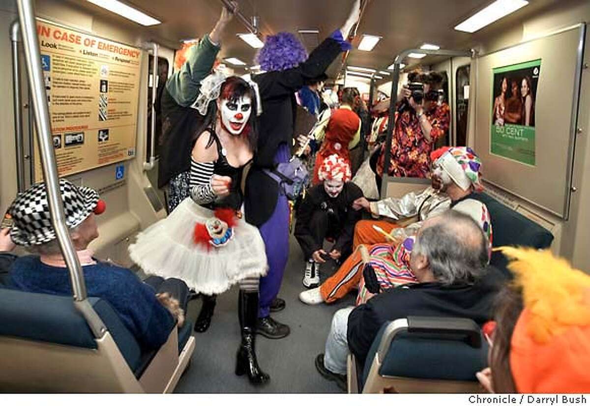 20 clowns surprise BART riders and a train becomes a fun house / Red ...