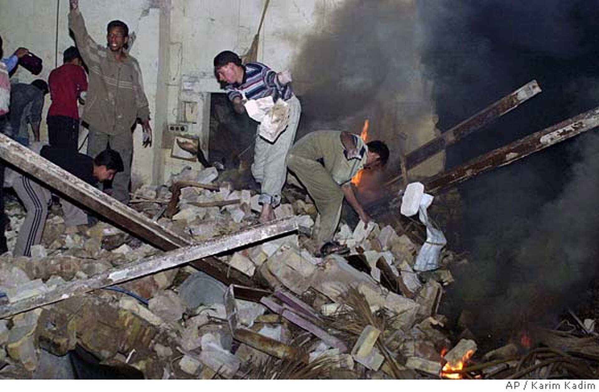 Car bomb rips through Baghdad hotel, killing 27 / BLAST: U.S. feared ...