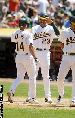 Team effort propels A's / Mulder wins 14th, Tejada gets 100th RBI ...