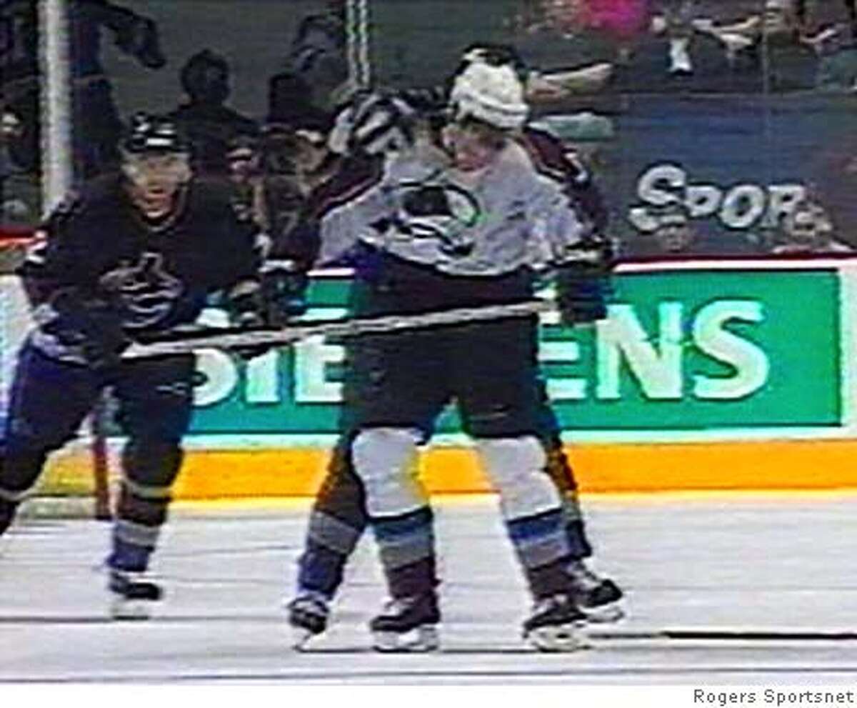 VIOLENCE IN HOCKEY / The lowest blow / Sucker punch puts 2 players ...