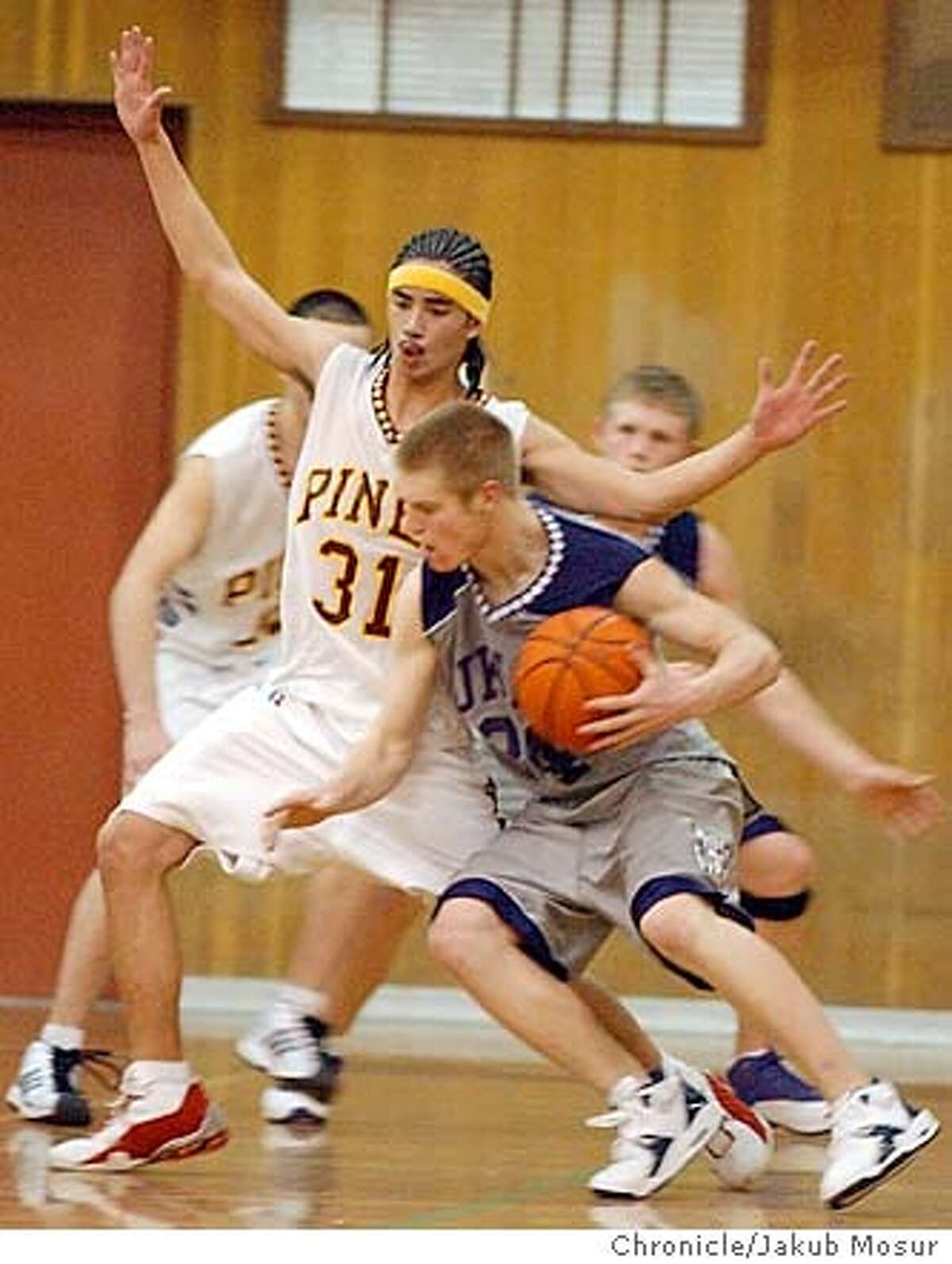 Piner shoots for the big leagues / Basketball coach remains cautious ...