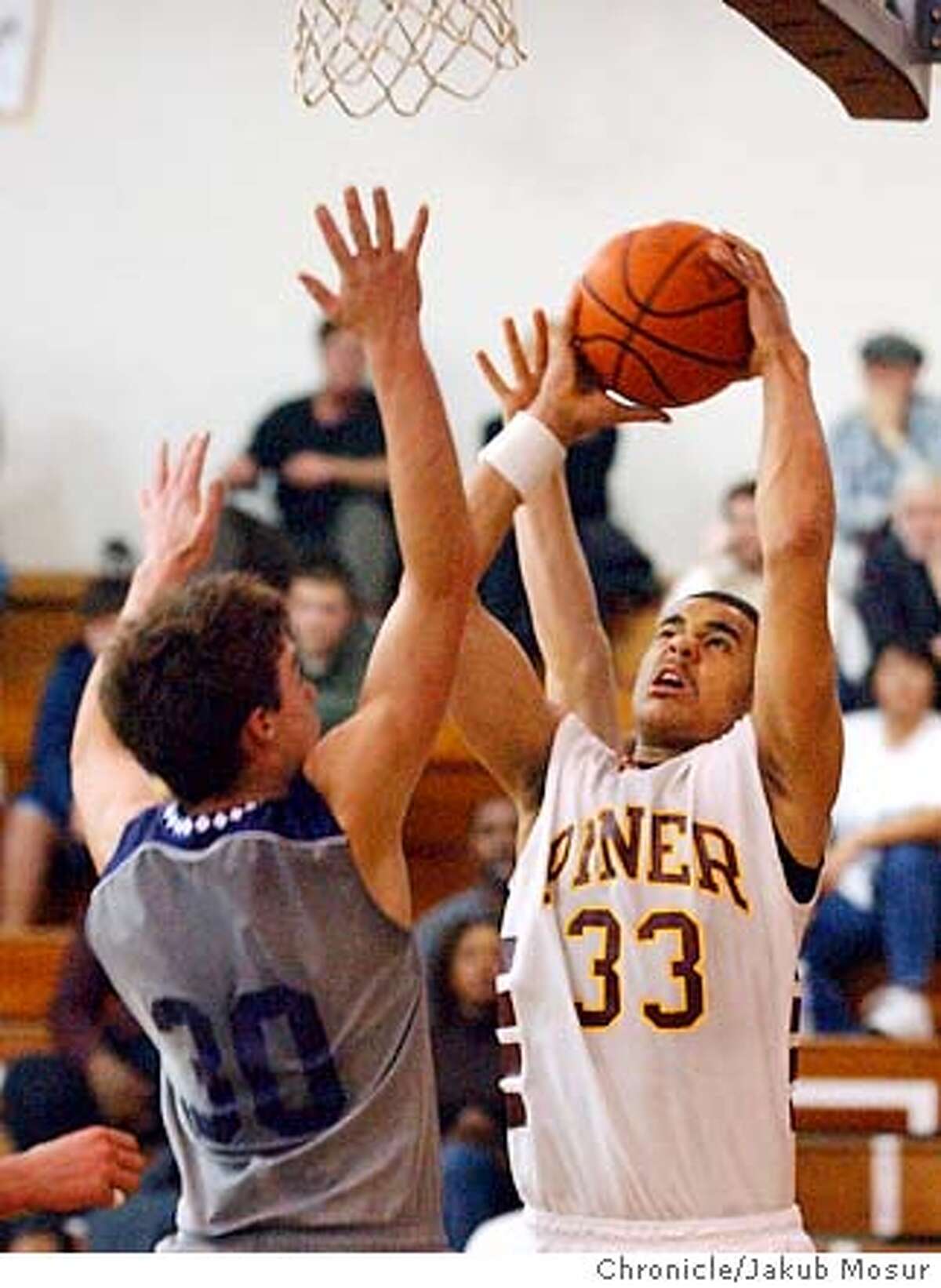 Piner shoots for the big leagues / Basketball coach remains cautious ...