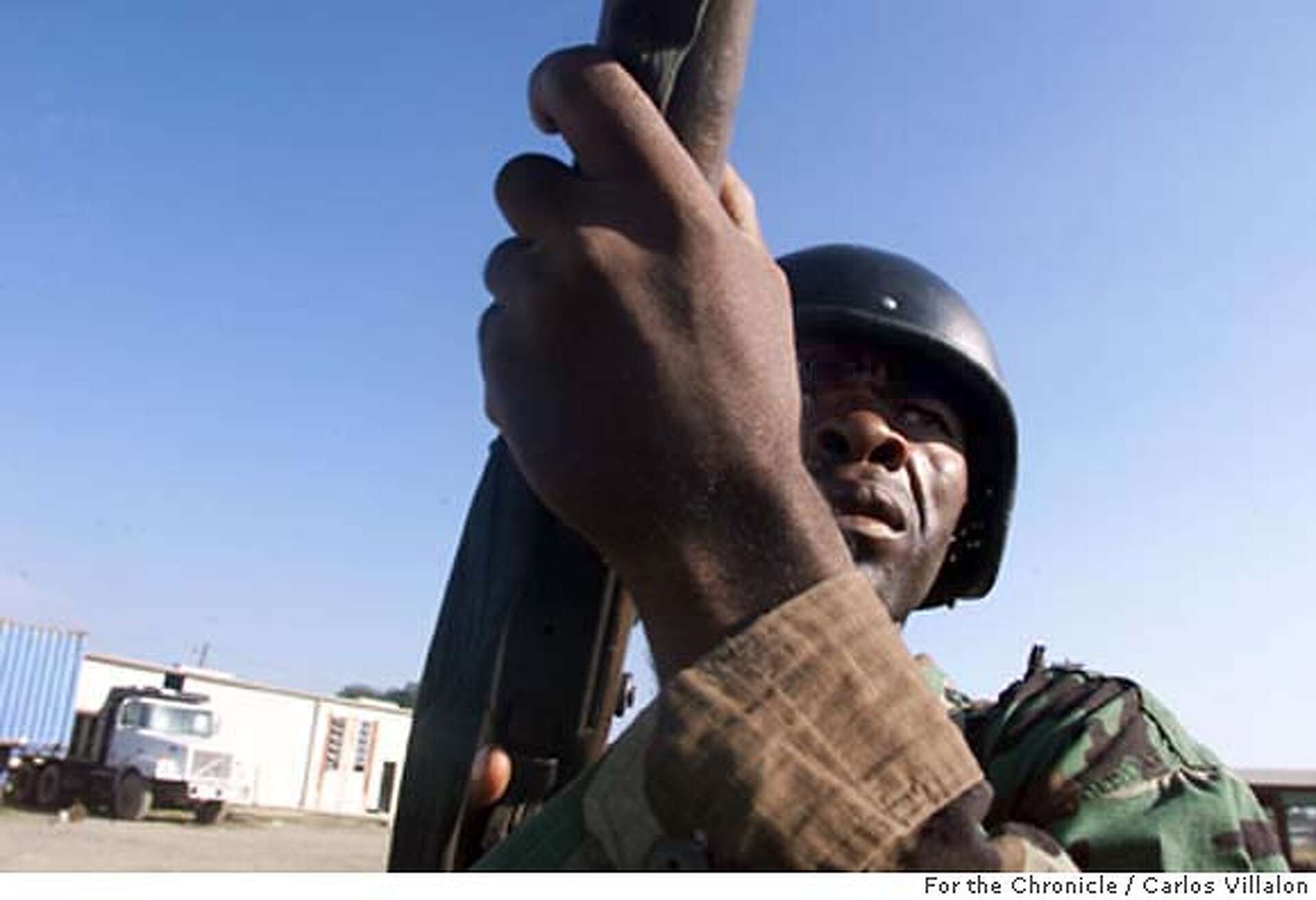 The men behind Haiti's rebellion / Infamous leaders wield bravado to ...